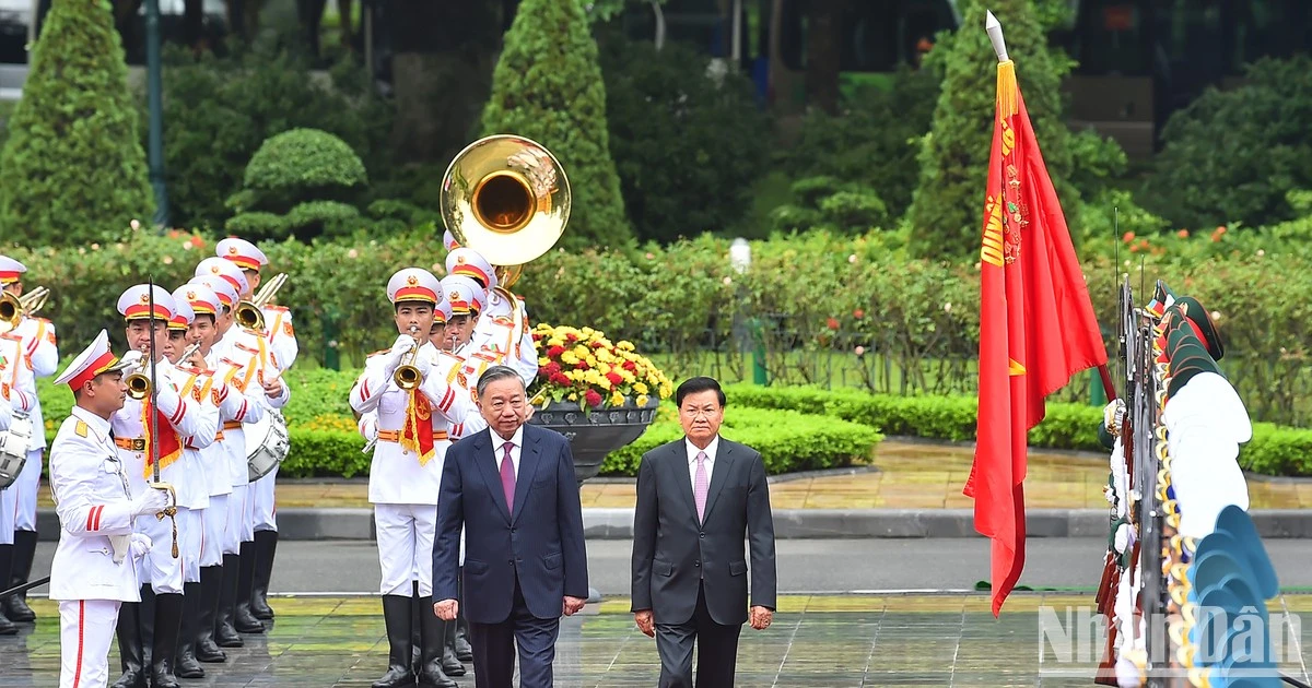 In Pictures: Top leader hosts welcome ceremony for Lao Party General ...